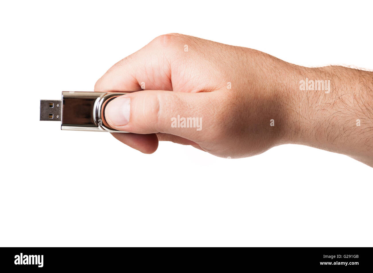 A standard USB memory hold by a white businessman hand and all is ...