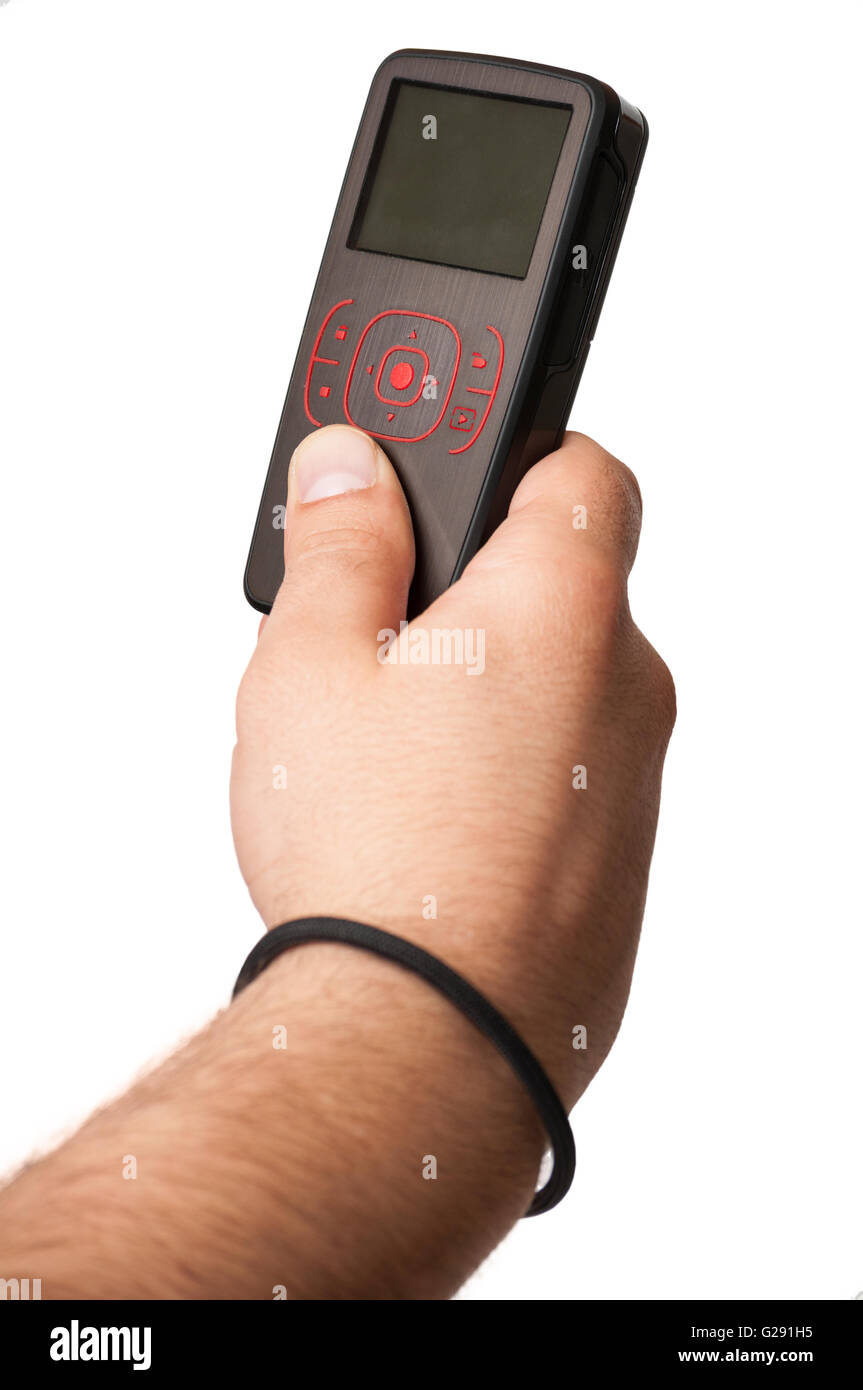 White hand holding a small portable video camera, isolated on a white ...