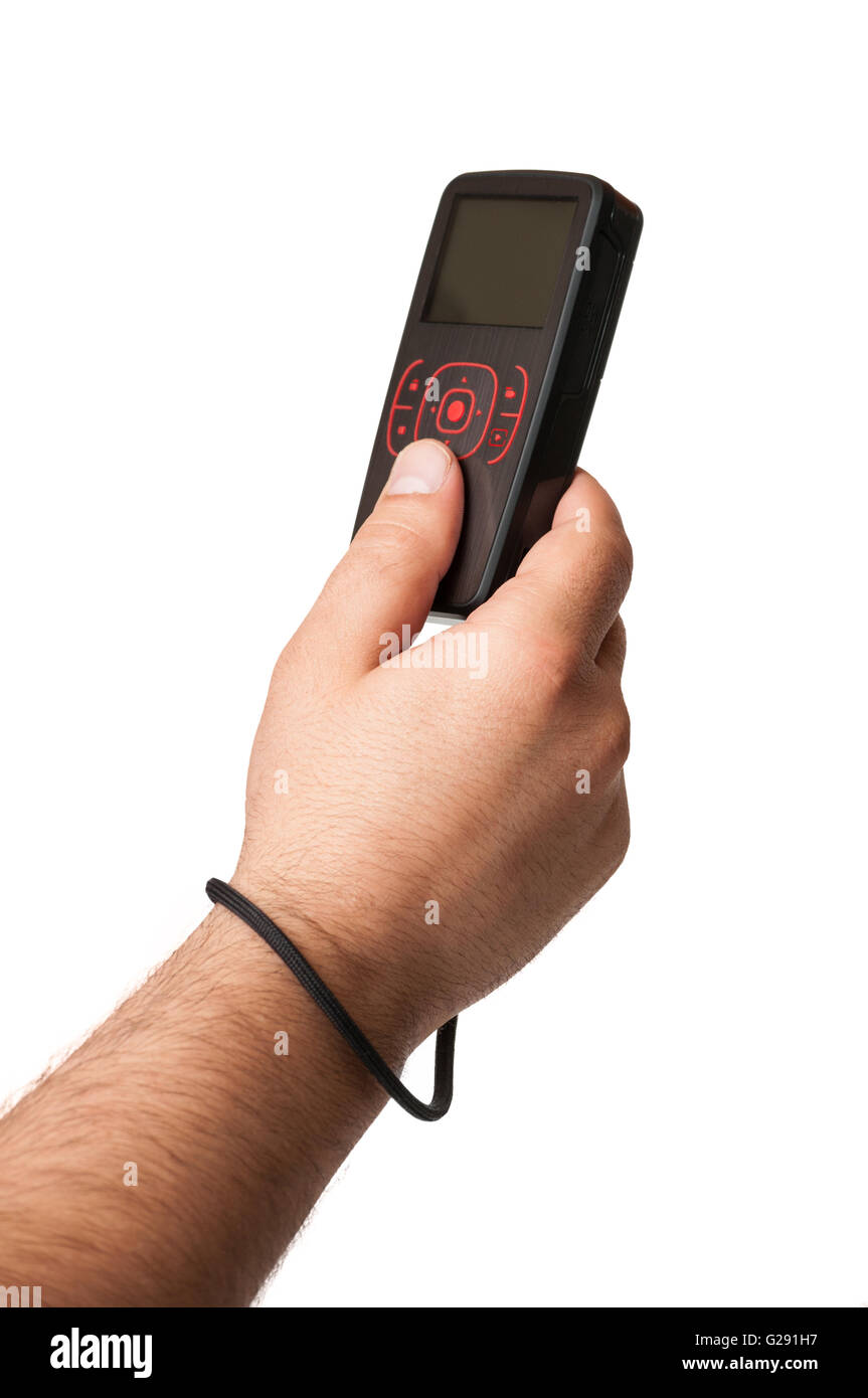 White hand holding a small portable video camera, isolated on a white ...