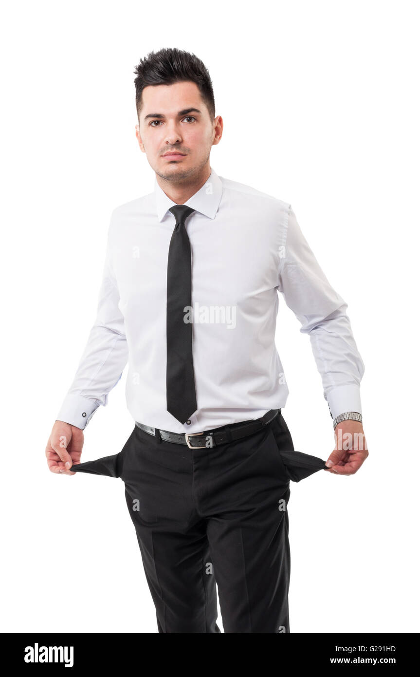 Broke businessman showing his empty pockets Stock Photo - Alamy
