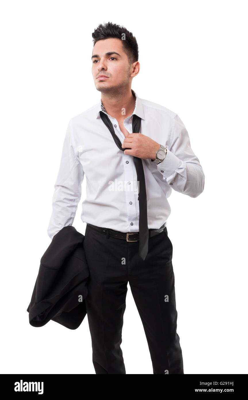 Busines man getting ready to relax after a day in the office. Isolated ...