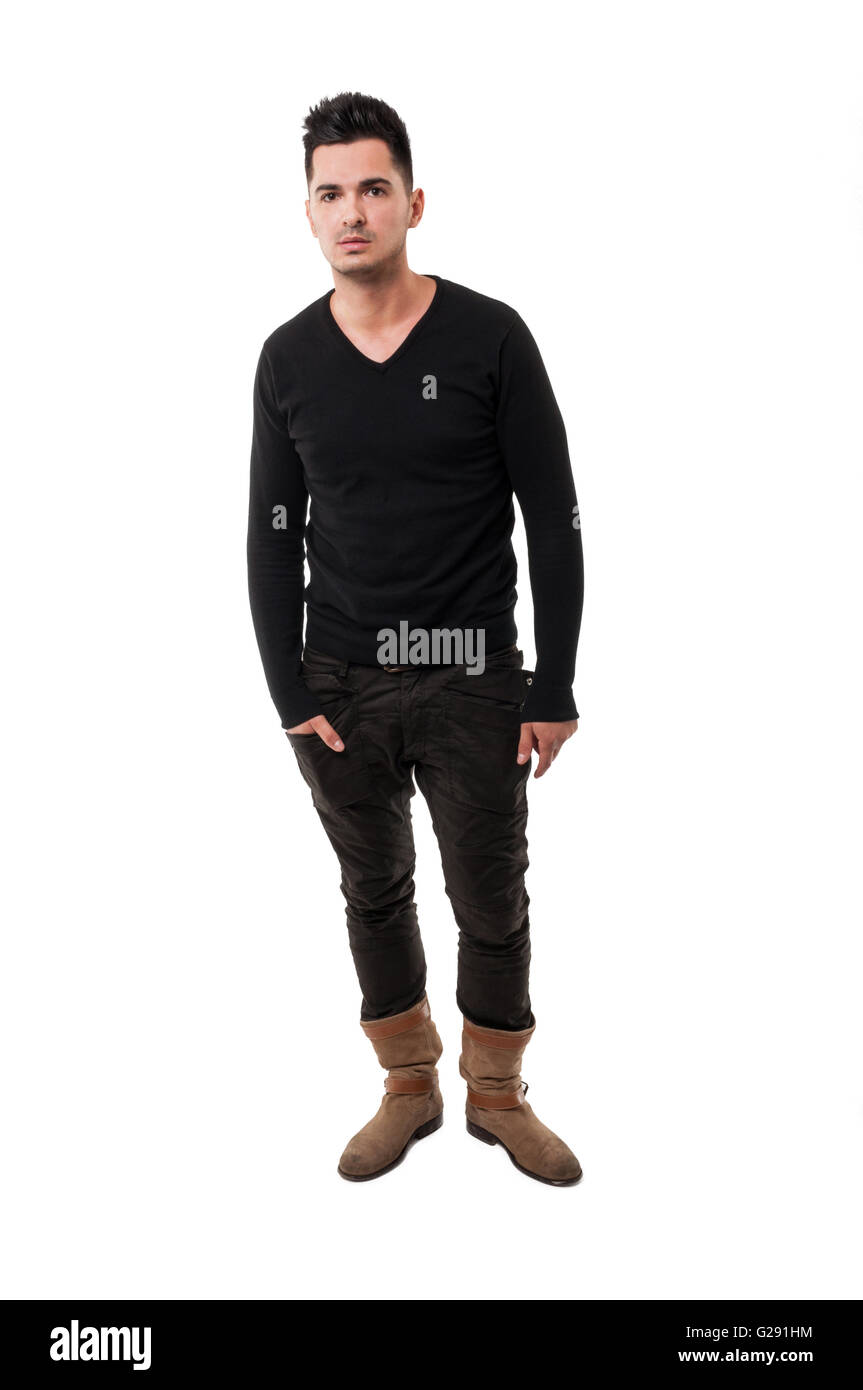 Handsome male model wearing a sweater and leather boots on a white ...