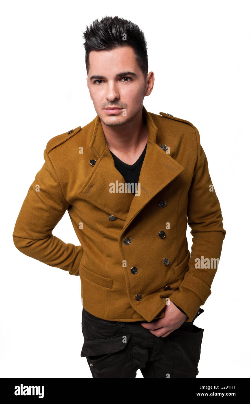 Beautiful male model looking at the camera and wearing a fancy jacket ...