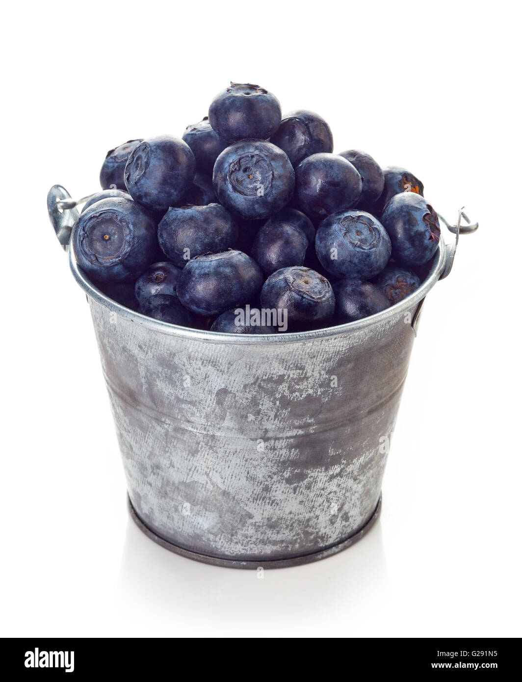 ripe blueberries in metallic bucket; isolated on white background Stock ...