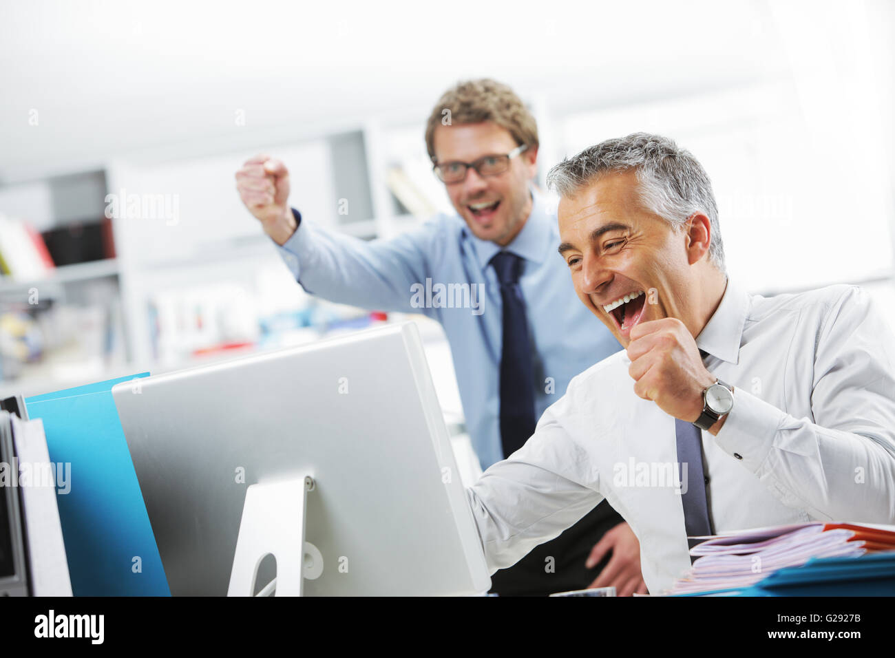 Excited celebrating middle aged businessman hi-res stock photography ...