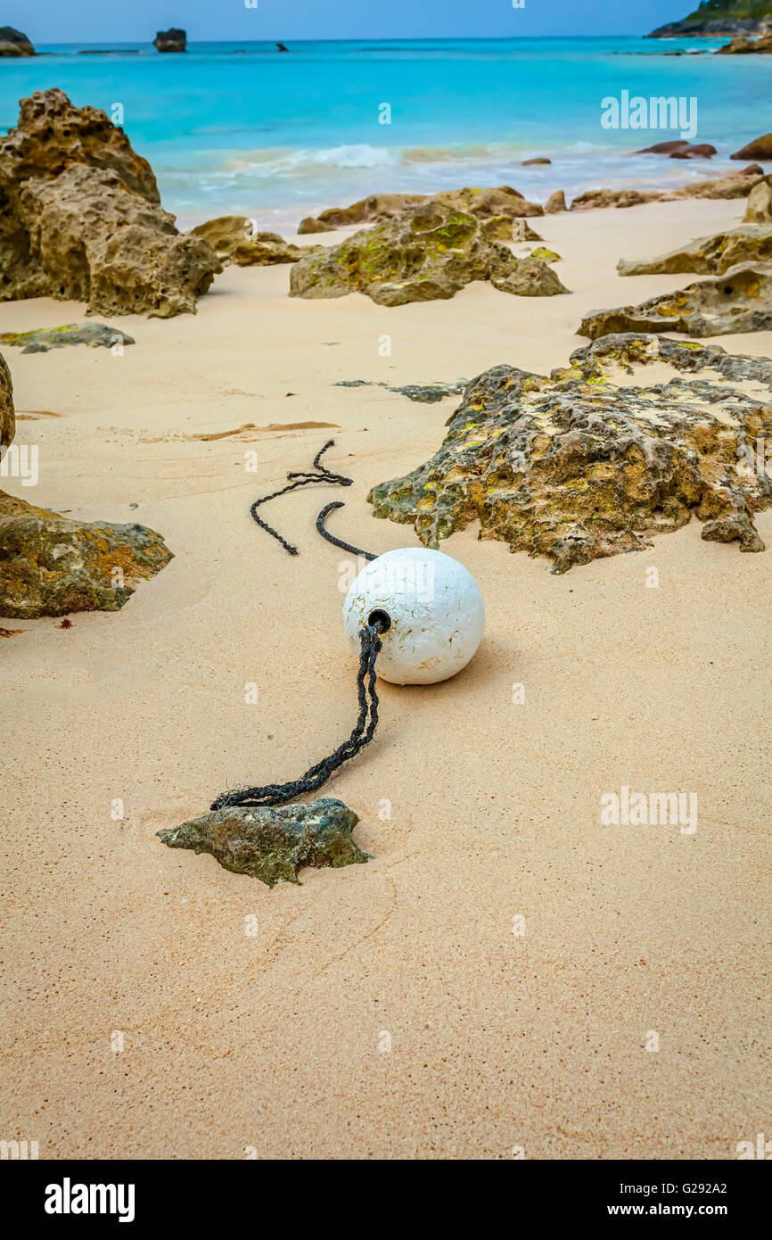 A buoy washed up on a Bermuda beach Stock Photo - Alamy
