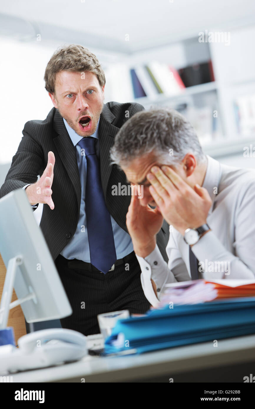Mature manager shouting office hi-res stock photography and images - Alamy
