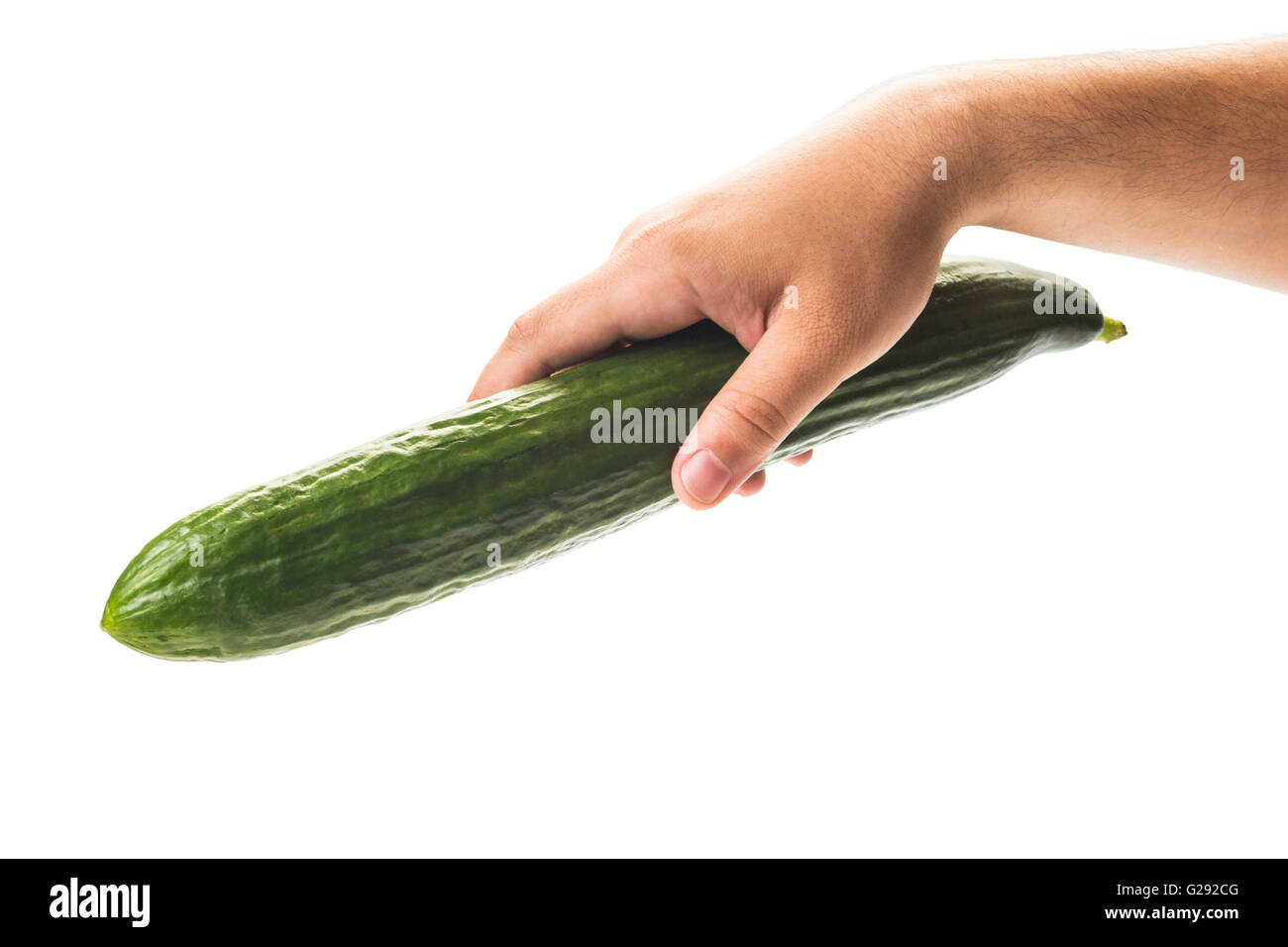 White man hand holding a big fresh green cucumber isolated on white ...