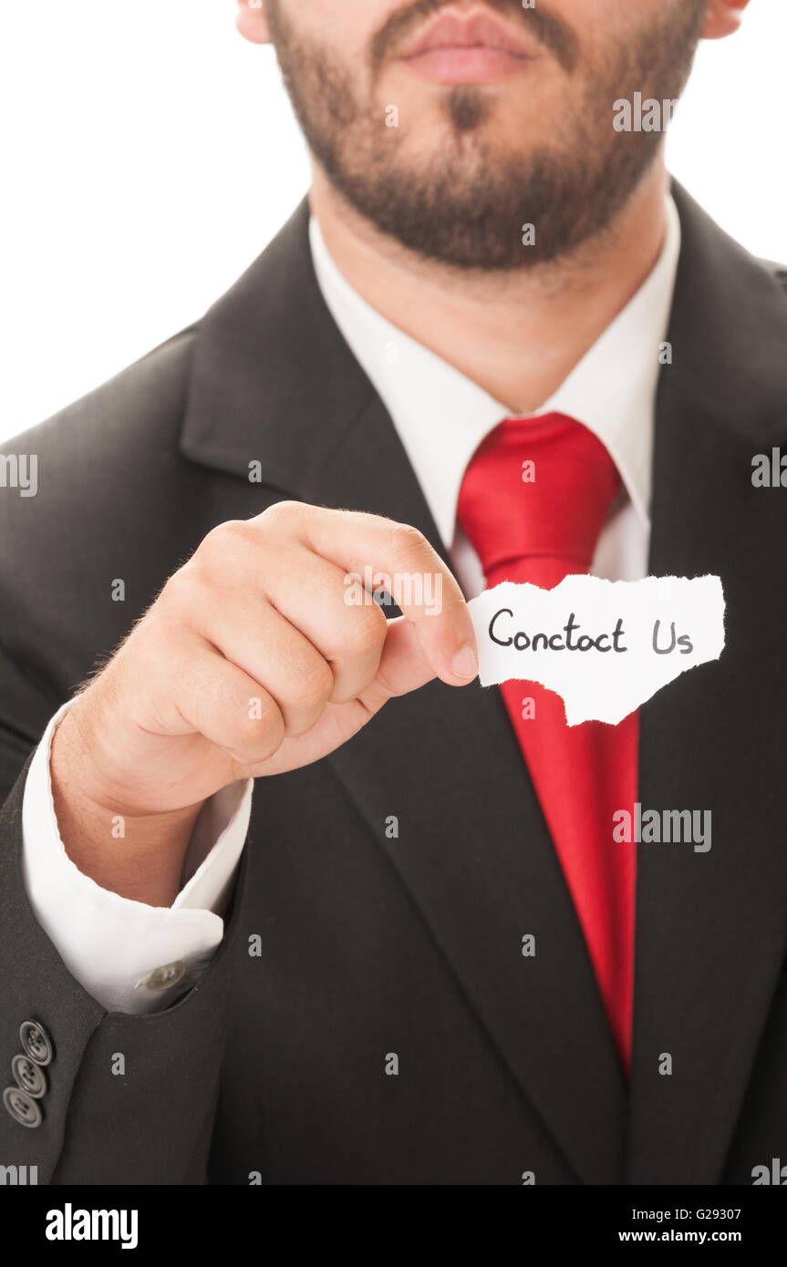 Contact us concept using an elegant man holding a piece of paper. He ...