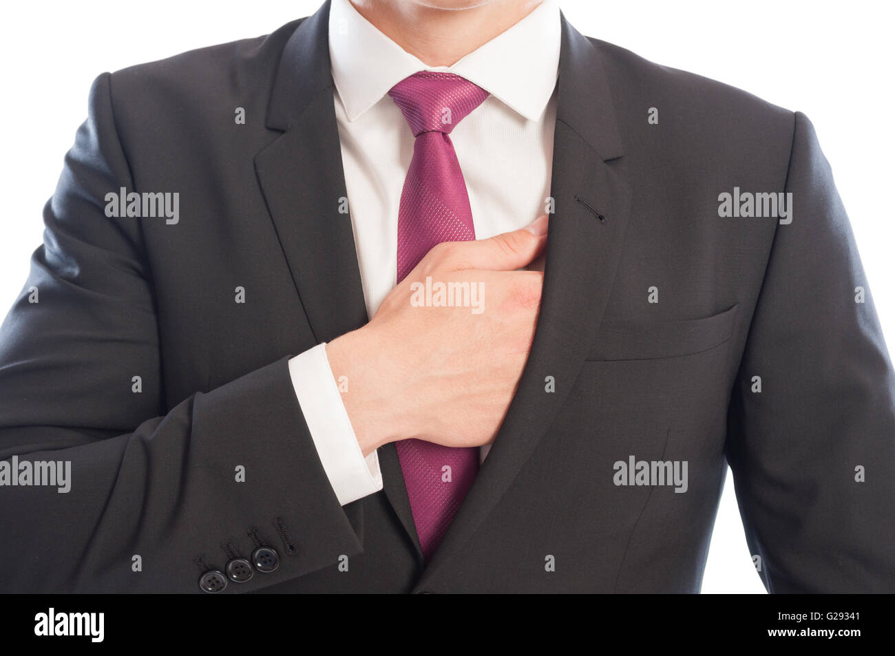 Elegant male model reaching his interior suit pocket with the right ...