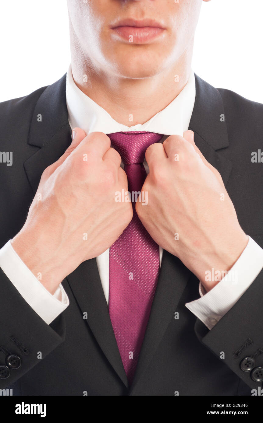 Elegant business male model fixing his white shirt collar Stock Photo ...