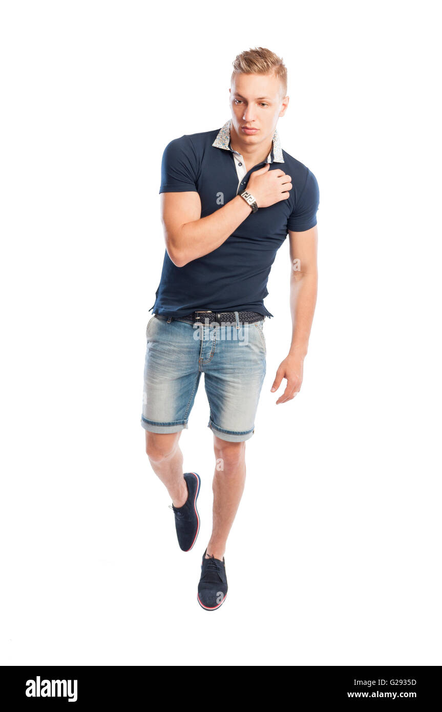 Fashion male model in summer clothes posing isolated on white ...