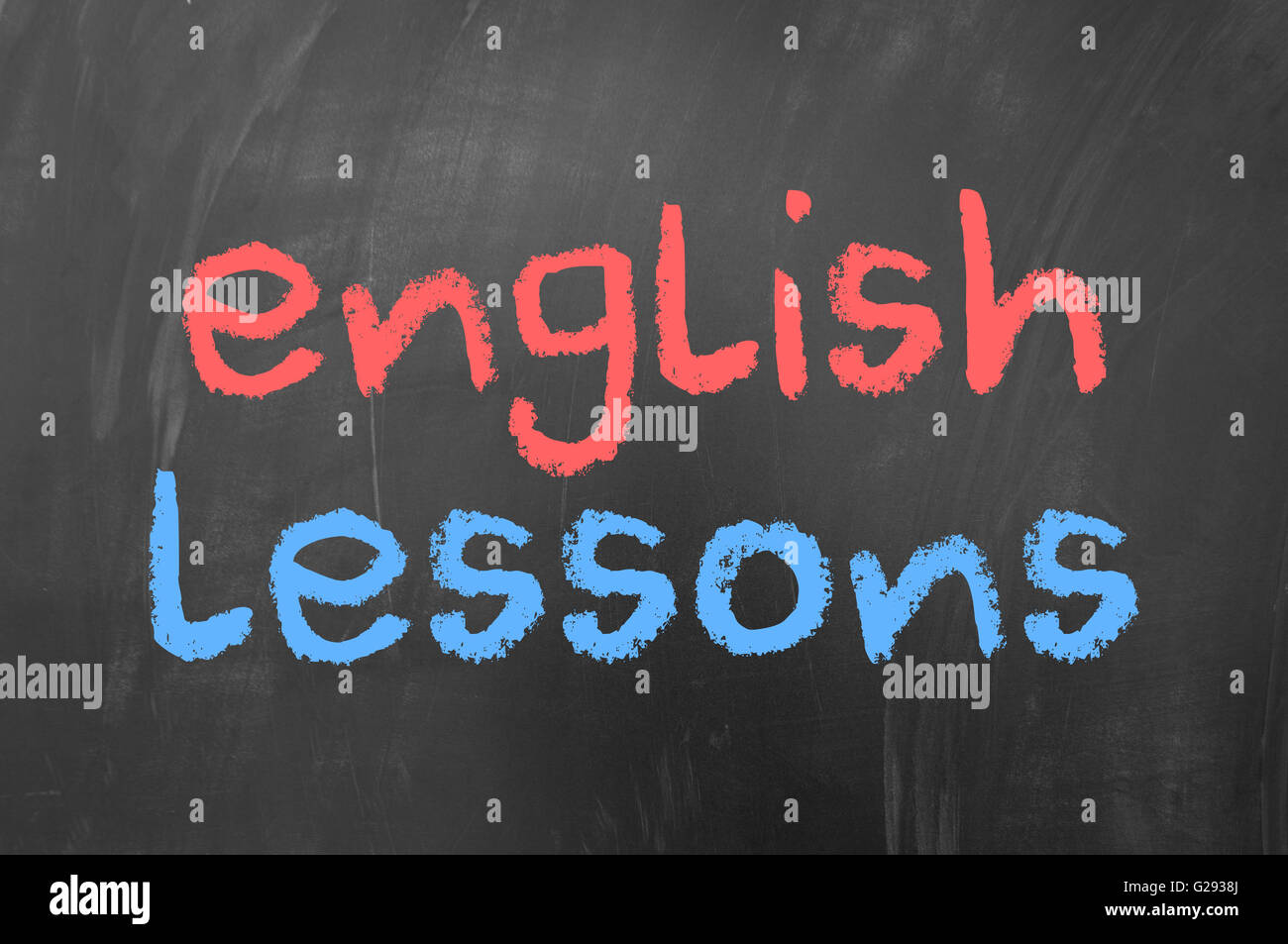 English lessons concept on blackboard with red and blue chalk Stock ...