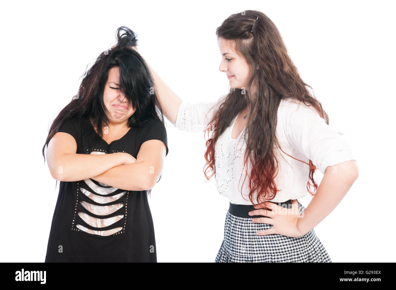 Bully girl grabbing hair. Bullying concept between girls isolated on ...