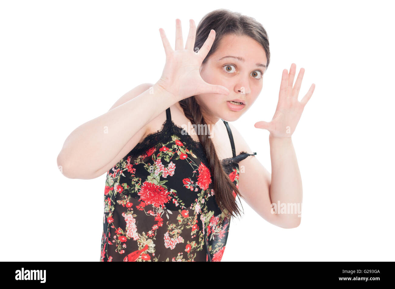 Natural casual teen girl acting scared isolated on white background ...