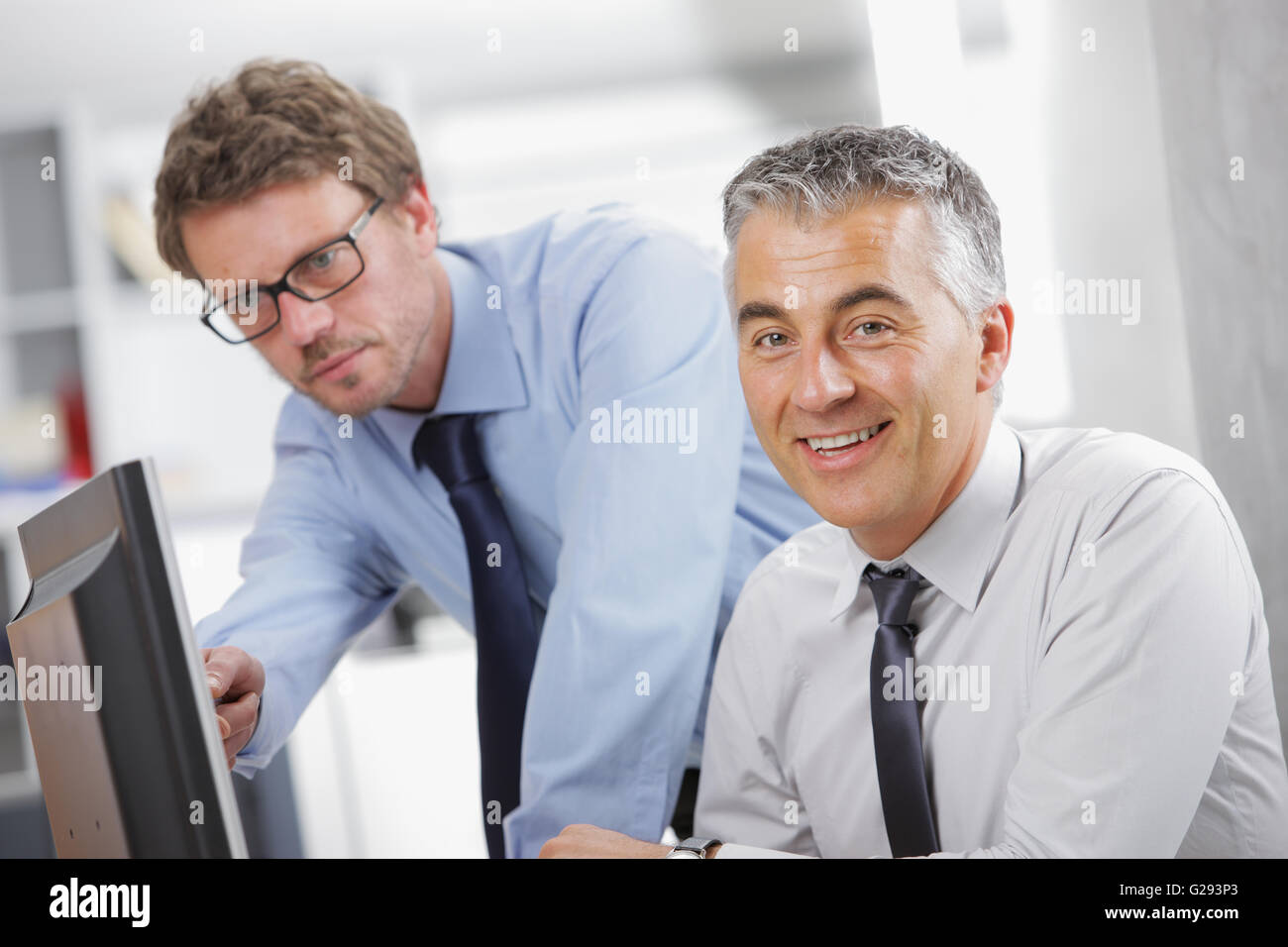 Two Business people in meeting in office Stock Photo - Alamy