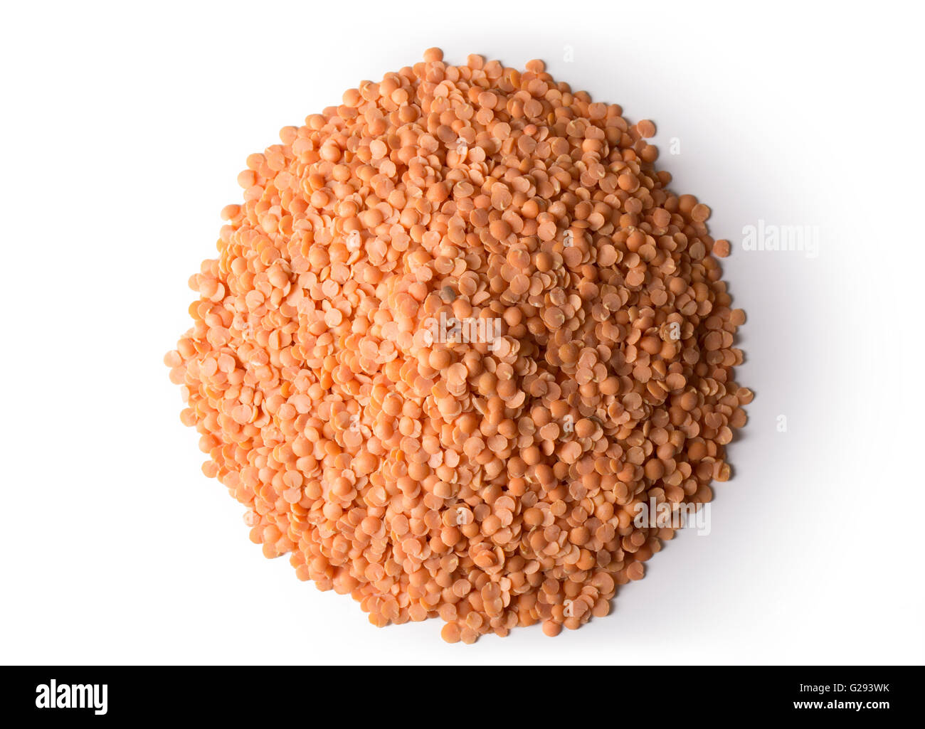 A pile of red lentils on a white background with a slight shadow Stock ...