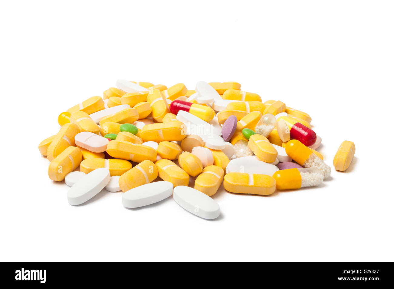 Colored pills isolated on white background Stock Photo - Alamy