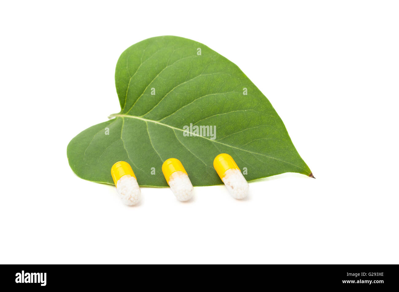 Green natural supplement capsules close hi-res stock photography and ...