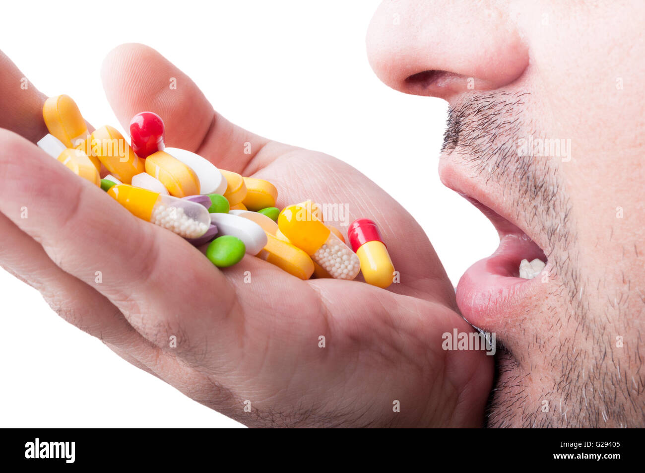 Taking vitamin supplement profile hi-res stock photography and images ...
