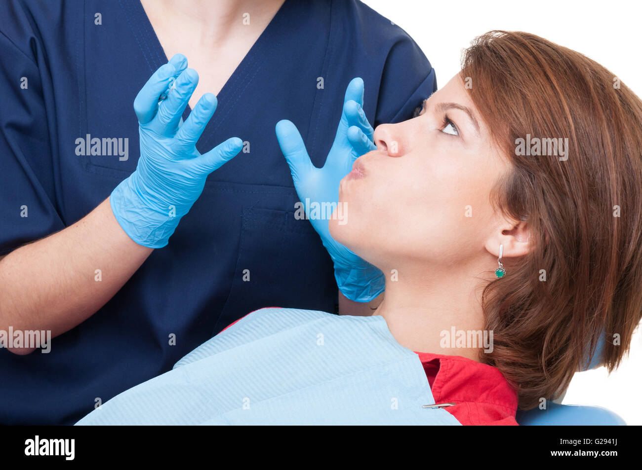 Stubborn patient in dentist office who don't want to open the mouth ...