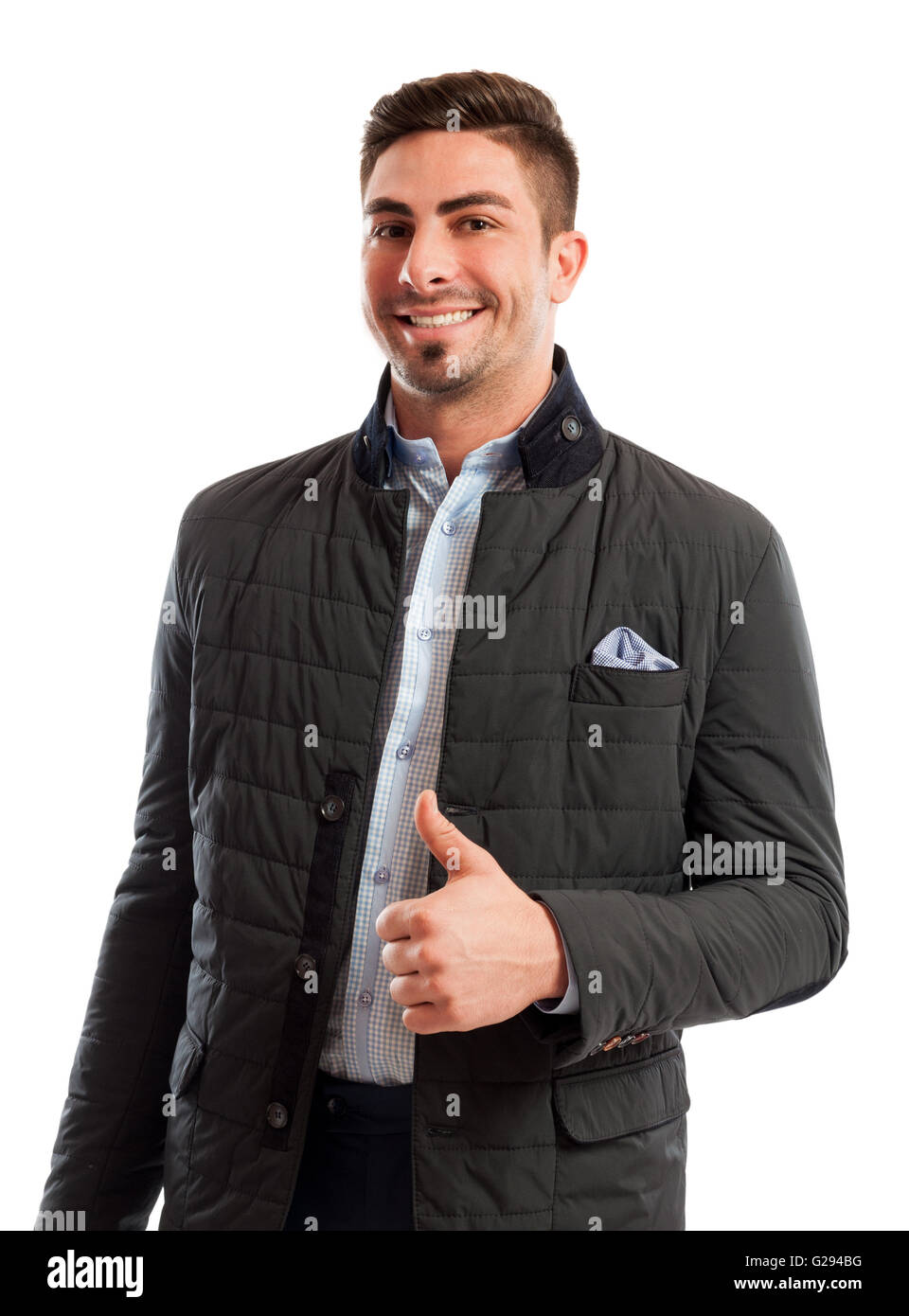 Handsome and funky sales man showing thumbs up and smiling confident ...