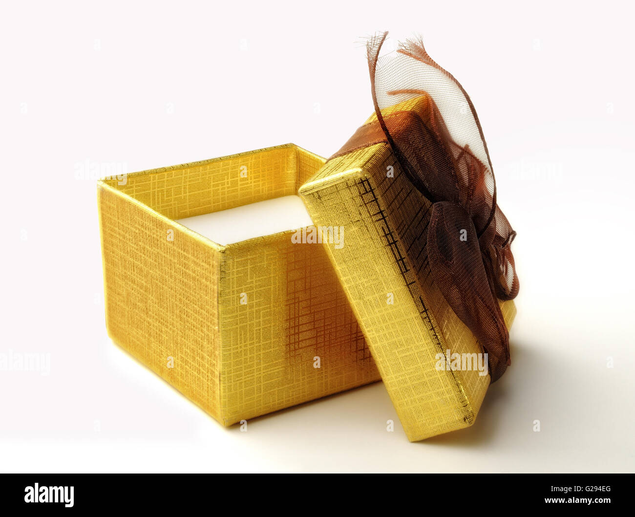 Open golden gift box isolated Stock Photo - Alamy