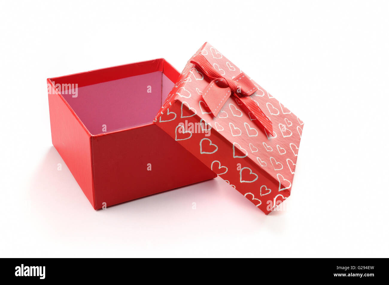 Decorative square open red gift box with red ribbon and white painted ...