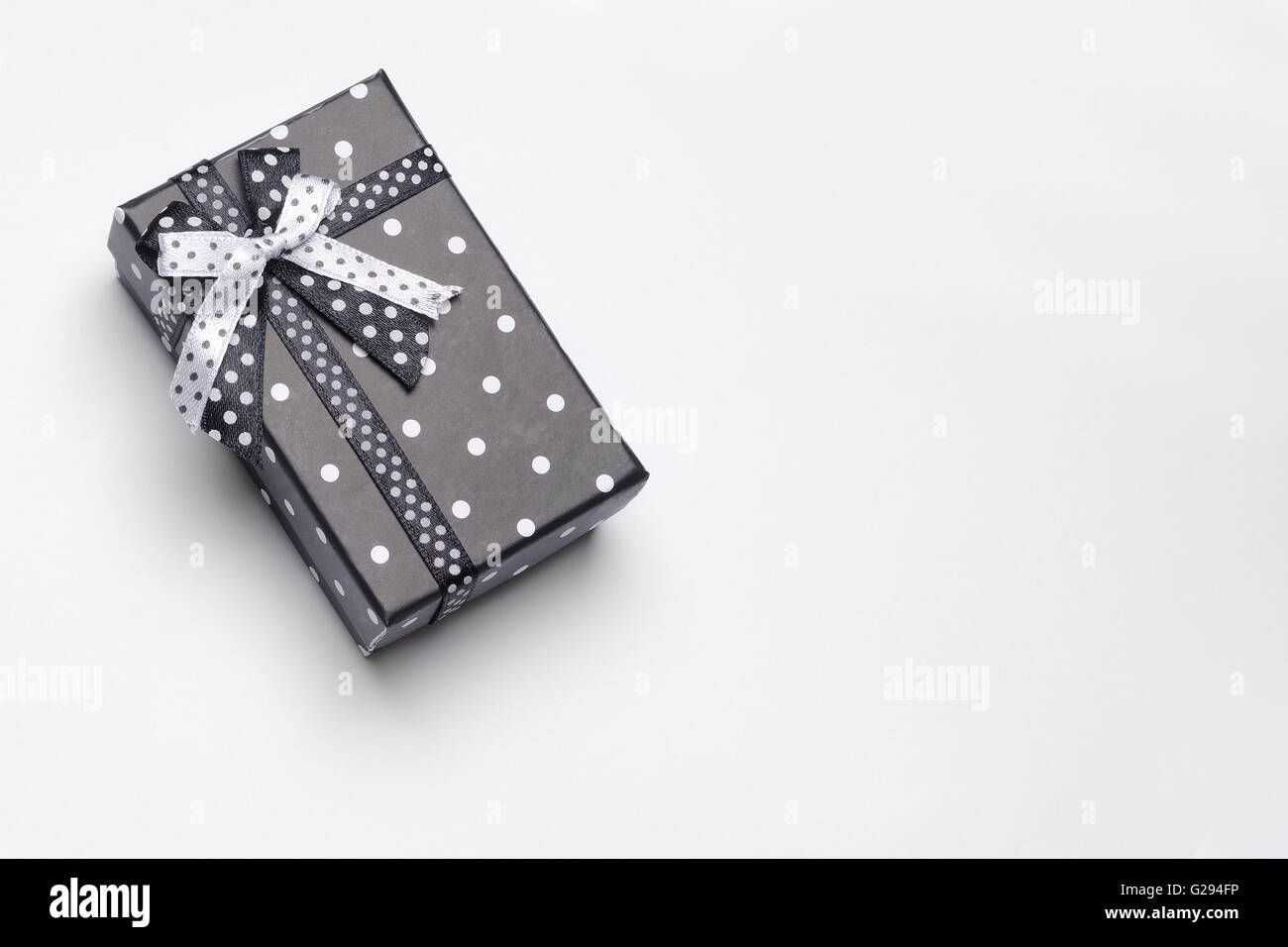 Decorative small black rectangular box gift with black and white ribbon ...