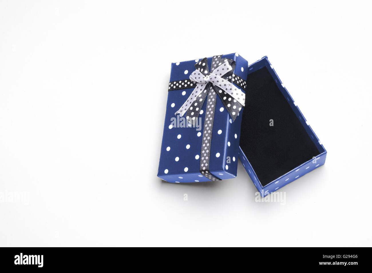 Decorative small blue rectangular box open gift with black and white ...