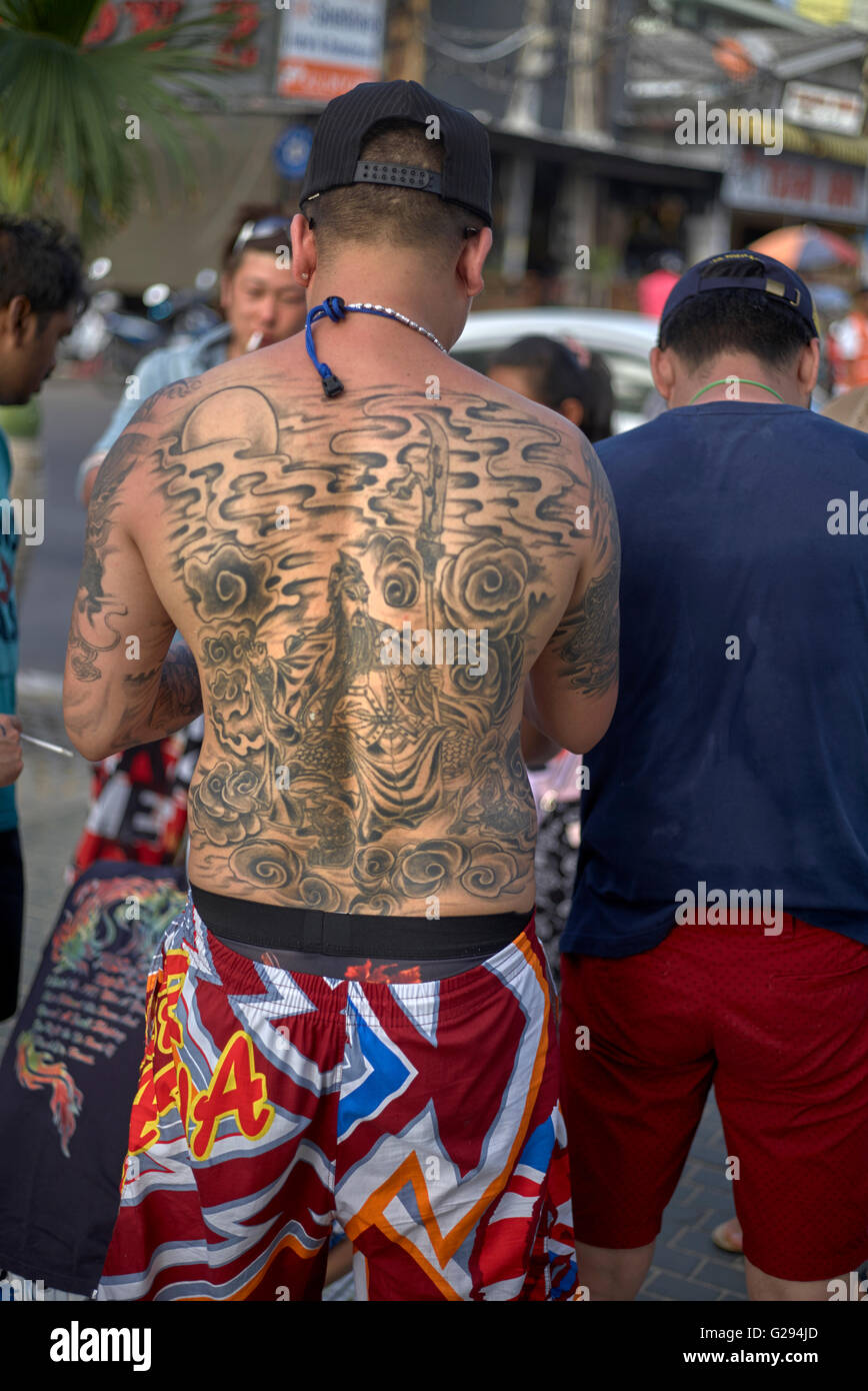 Back tattoo. Tattooed man. Shirtless man with large back tattoo Stock ...