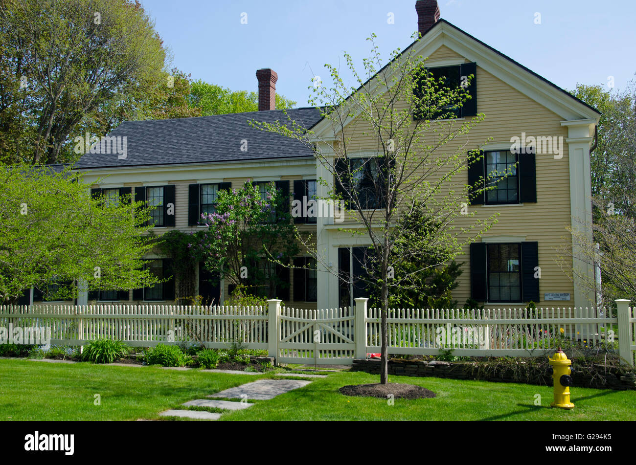 Yellow clapboard historical house in spring, Yarmouth, ME, USA Stock ...
