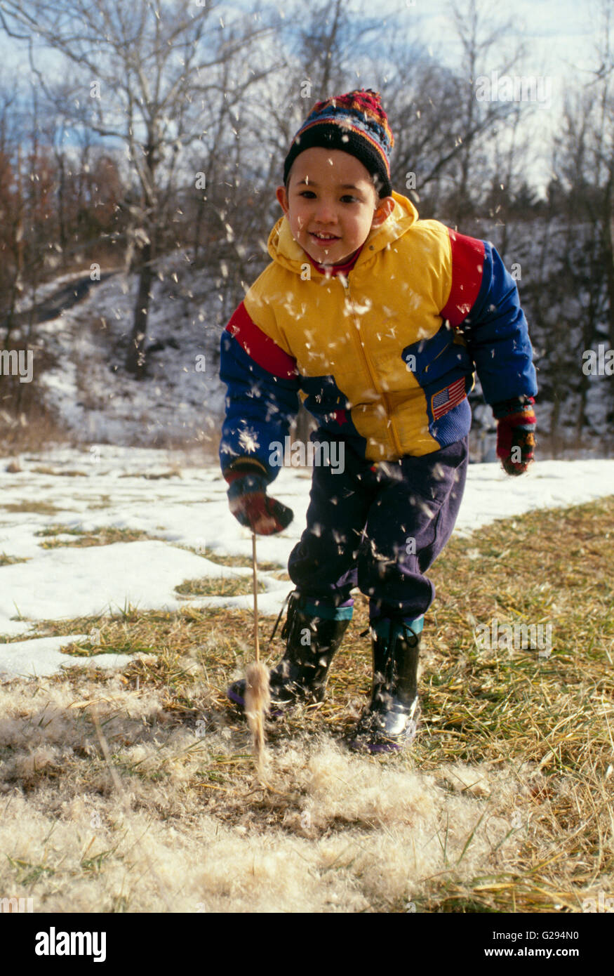 Boys cattail cold cute dried grass hi-res stock photography and images ...