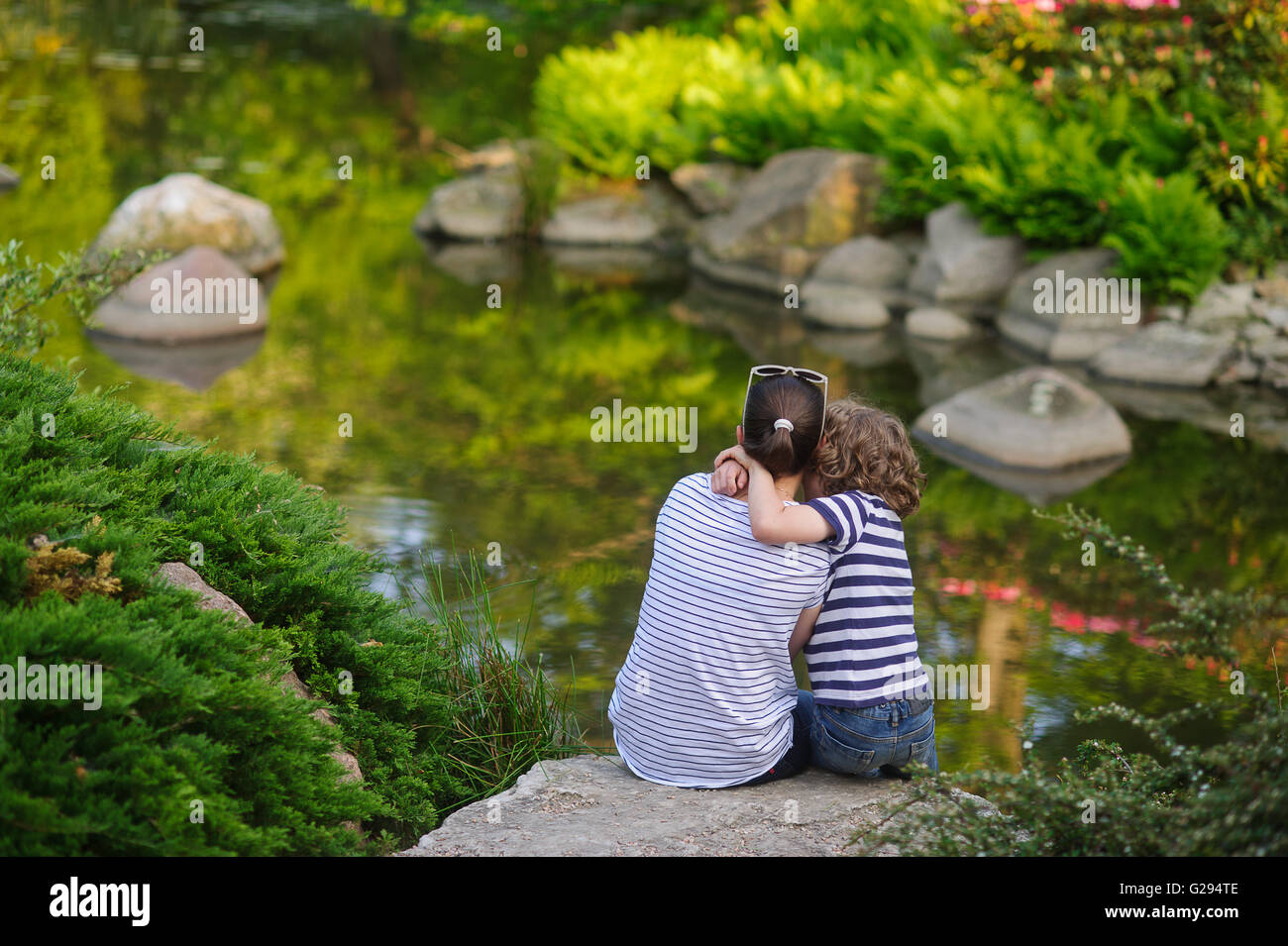 Hugging huddled together hi-res stock photography and images - Alamy