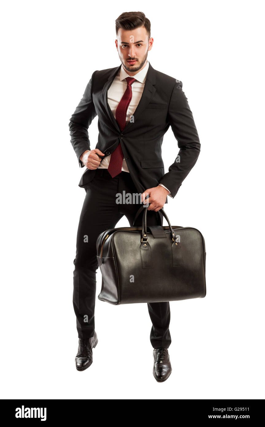 Elegant and angry sales man holding a handbag and running Stock Photo ...