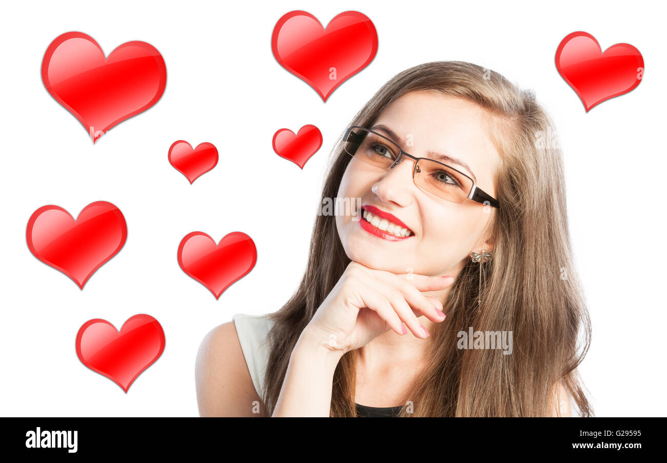Woman in love thinking and dreaming at flying red hearts. Romance ...