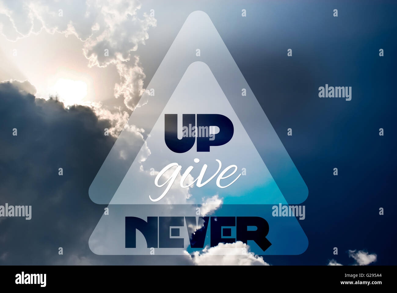 Never give up concept quote on blue sky background Stock Photo - Alamy