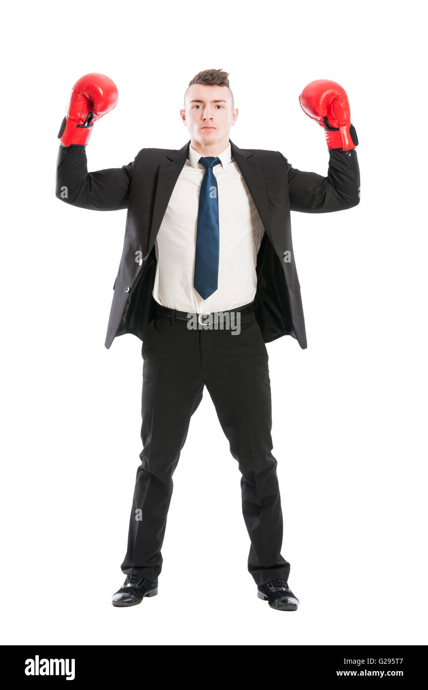 Business man with red boxing gloves standing with arms up like a ...