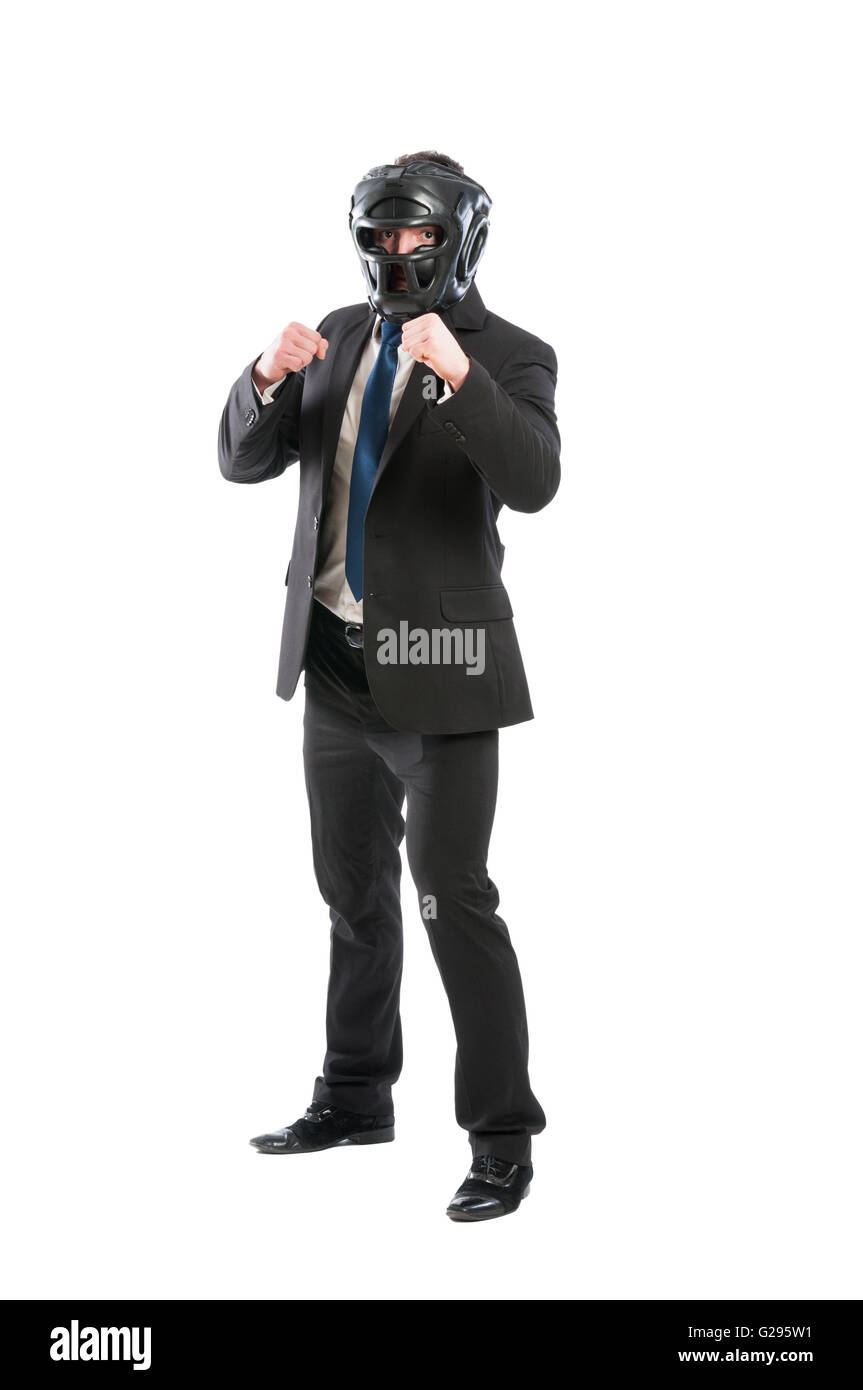 Full body of business man on guard wearing boxing helmet Stock Photo ...