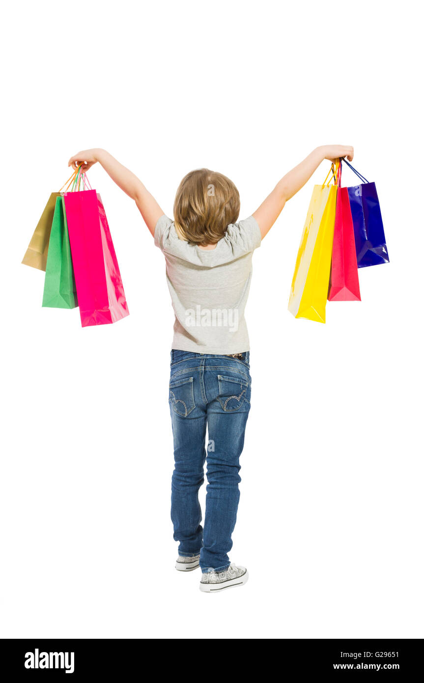 Full body of young shopping girl from behind isolated on white ...