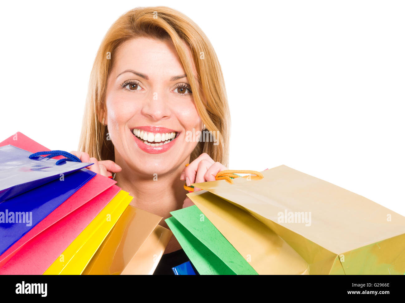Face of a beautiful smiling shopping woman on white background with ...