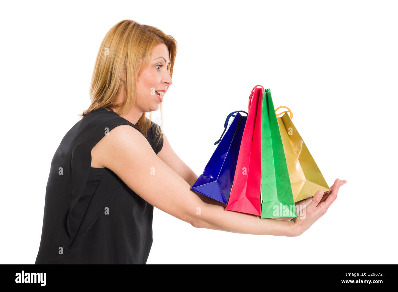 Carrying heavy shopping bags hi-res stock photography and images - Alamy