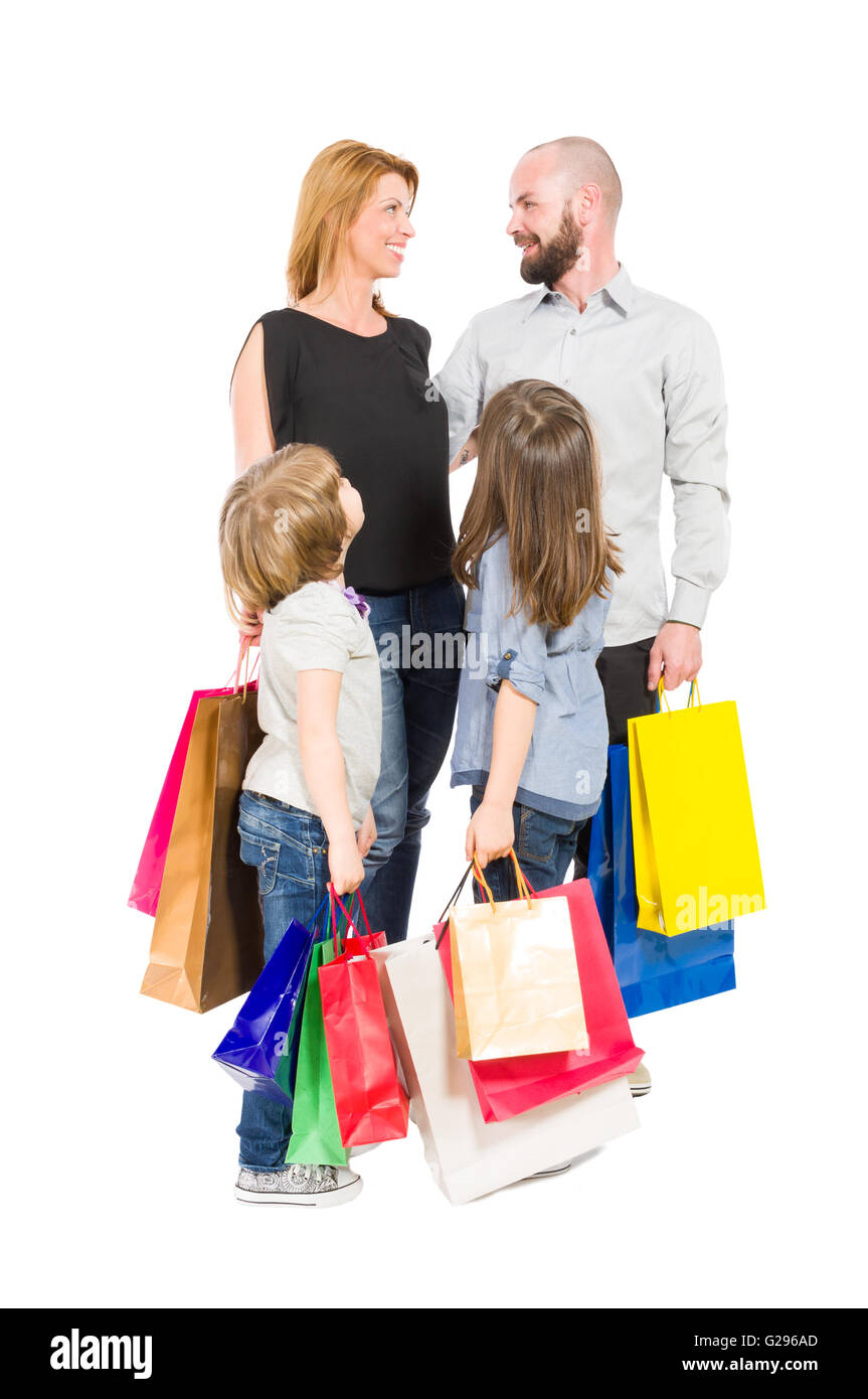 Happy shopping family with shopping bags isolated on white background ...