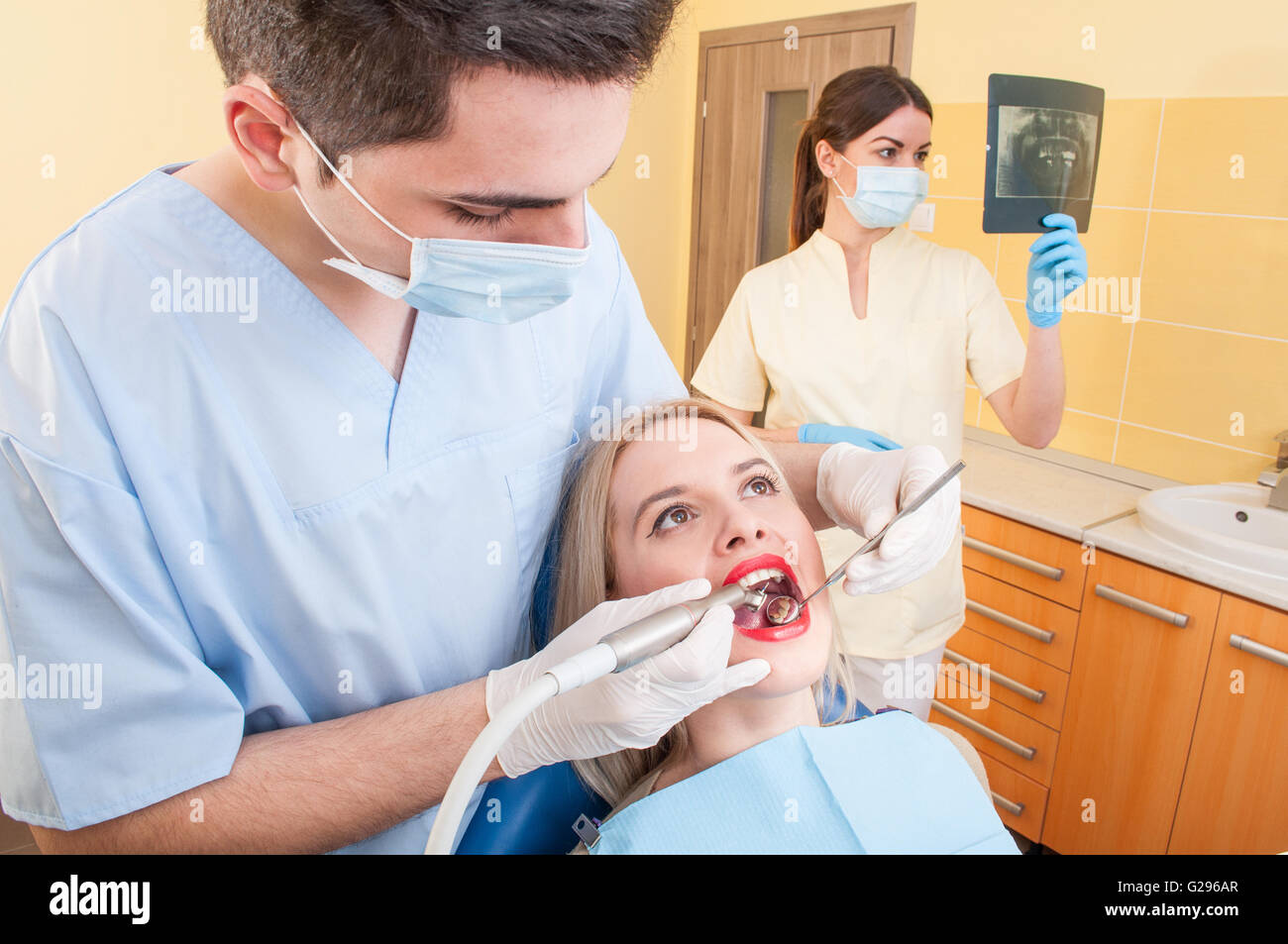 Getting teeth checked hi-res stock photography and images - Alamy
