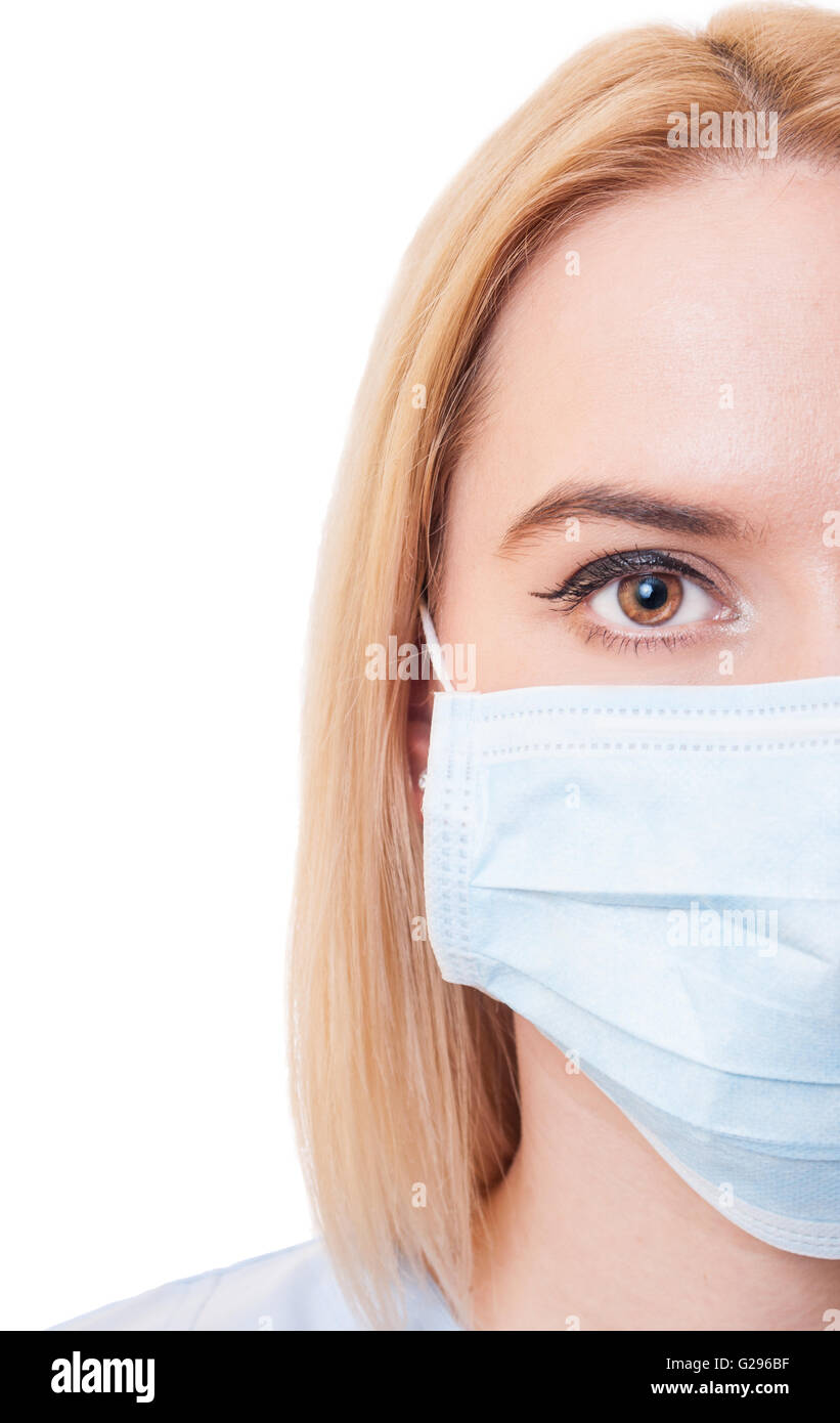 Half face of a beautiful female doctor on white background Stock Photo ...