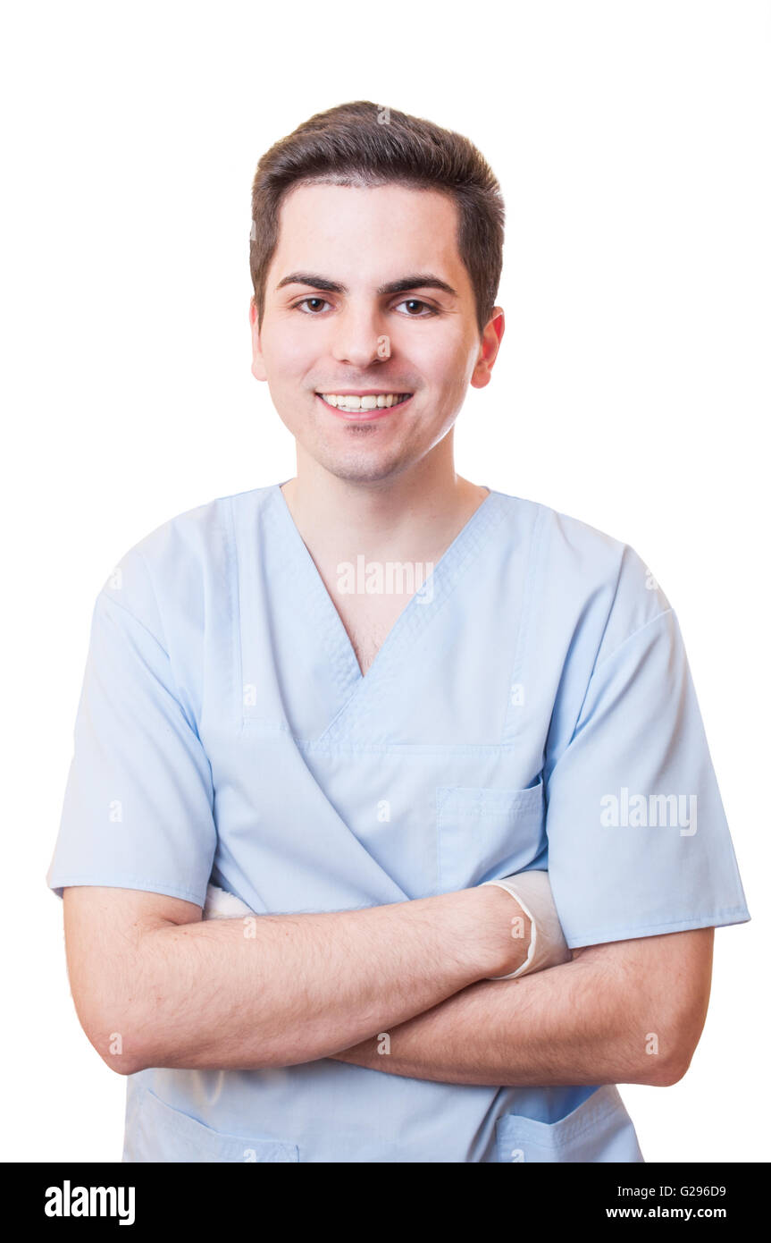 Friendly smiling male dentist standing on white studio background Stock ...