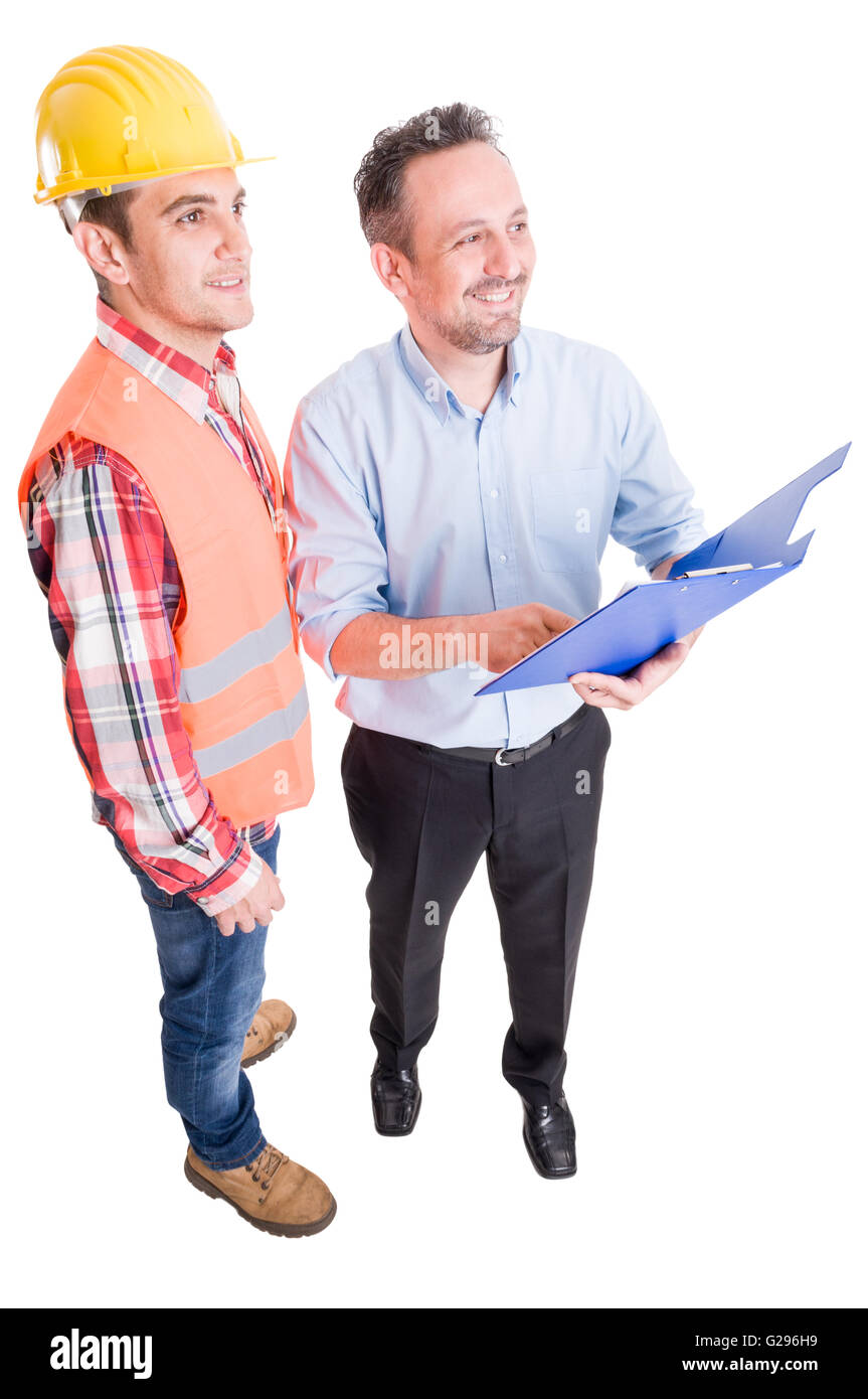 Happy contractor and construction worker holding clipboard Stock Photo ...