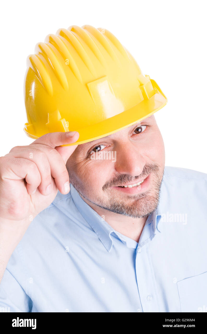 Polite engineer or architect touching helmet as salutation Stock Photo ...