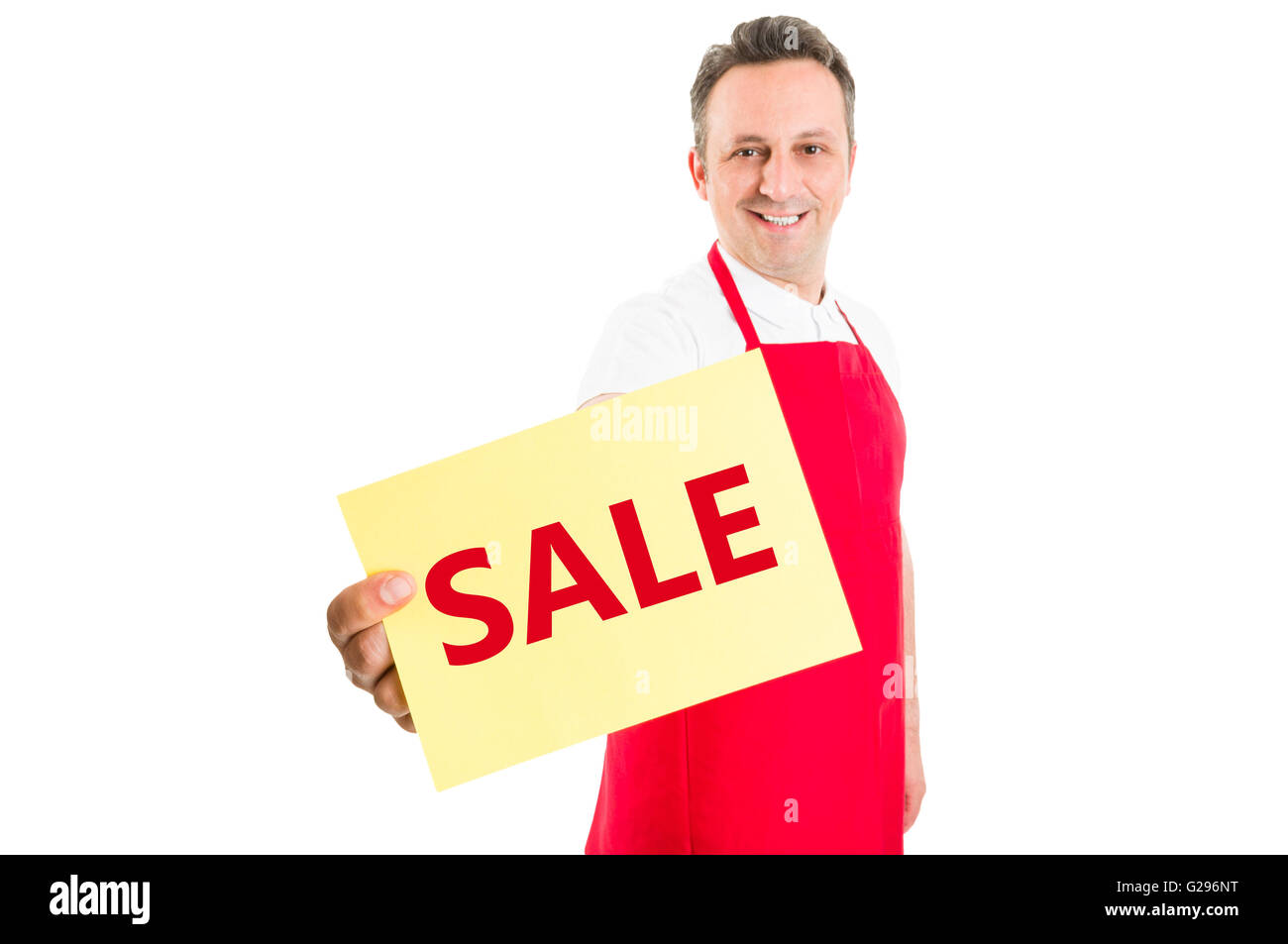 Supermarket employee holding sale sign and smiling to the camera Stock ...