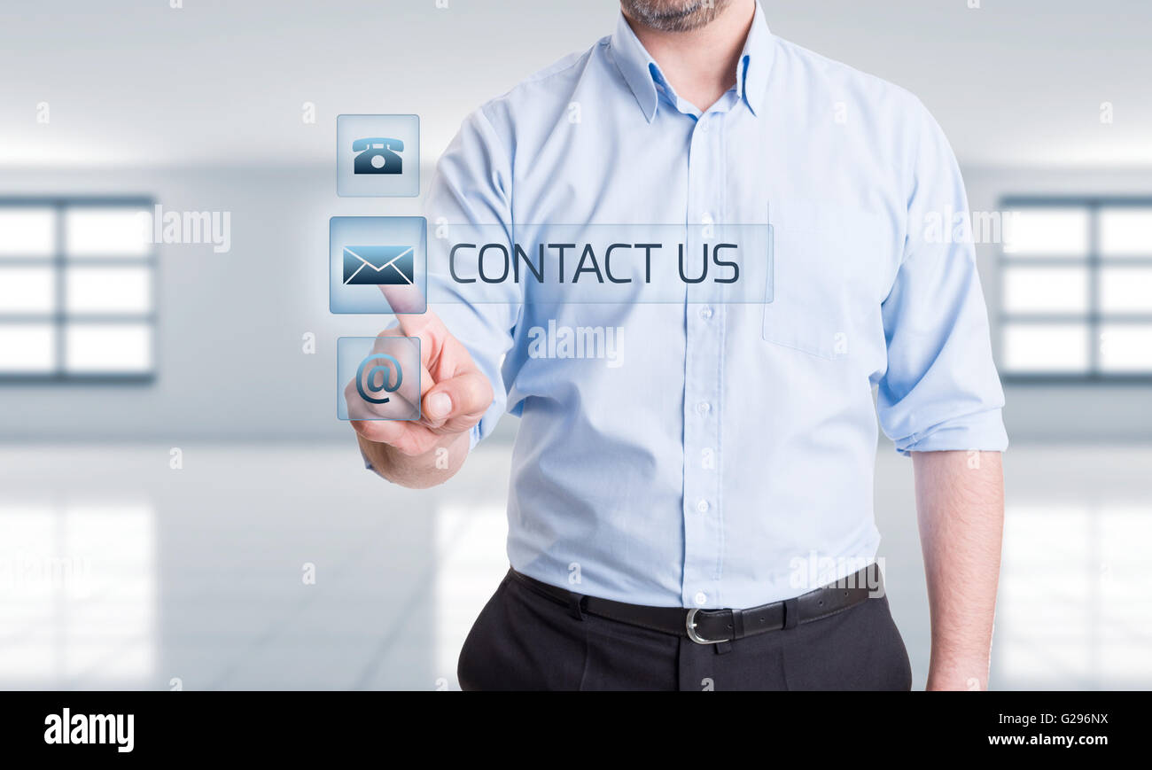 Contact options in digital futuristic concept with hand pressing button ...